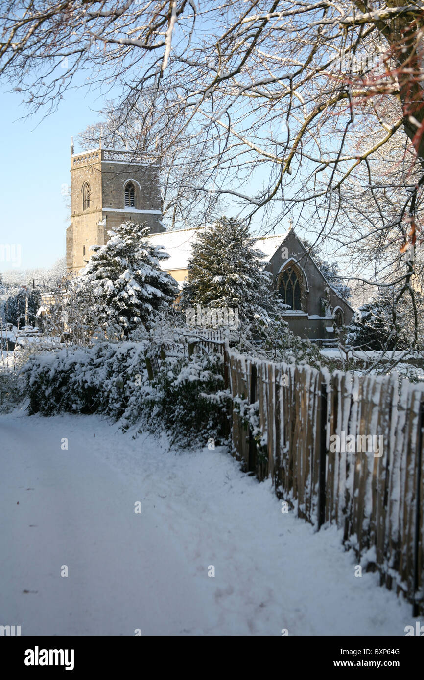 Village church snow scene Stock Photo - Alamy