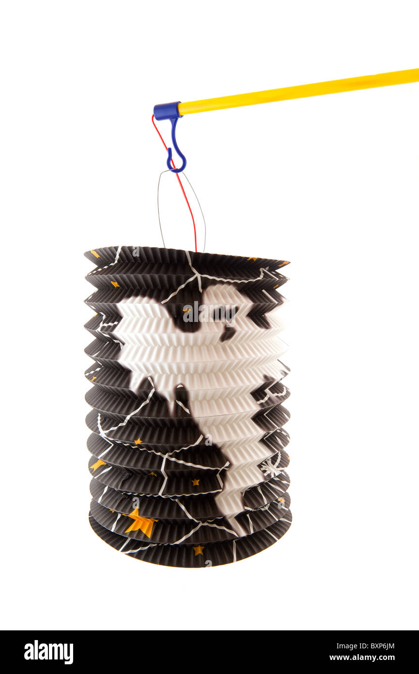 Paper lantern with scary goast on black isolated over white Stock Photo ...
