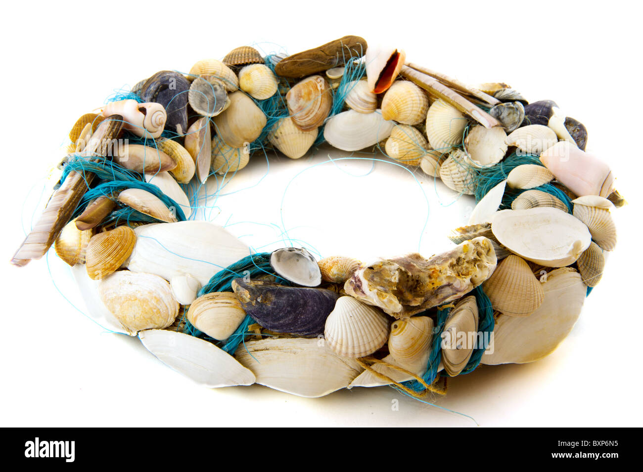 round shell wreath with blue rope isolated over white Stock Photo - Alamy