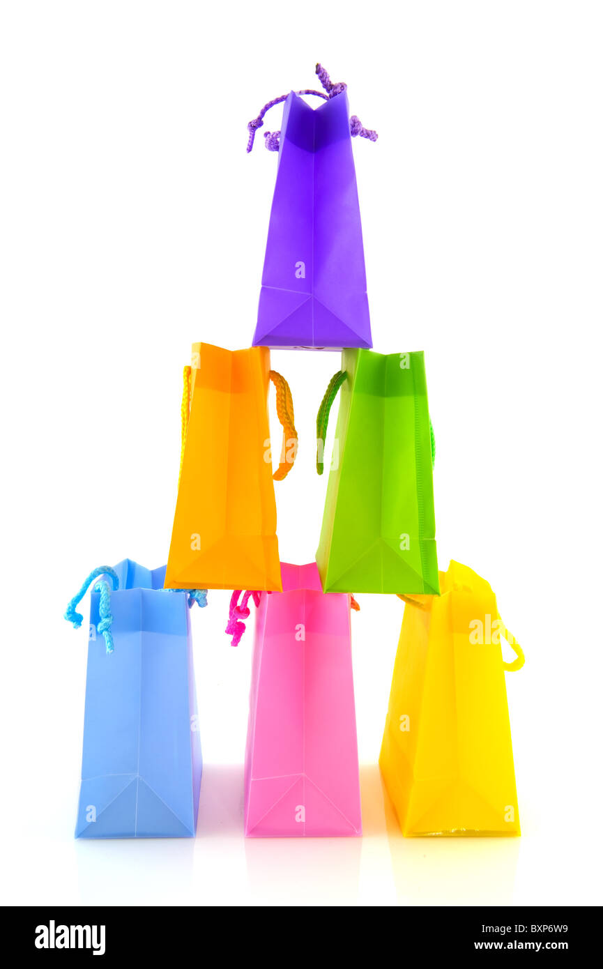 Colorful empty shopping bags isolated over white Stock Photo - Alamy