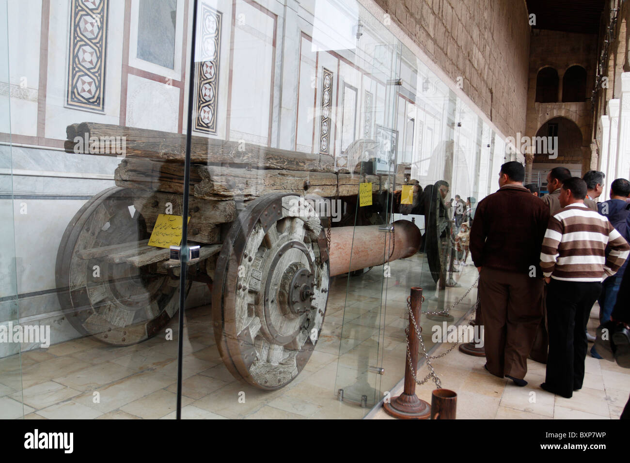 An old wooden bullock cart on display inside Omayyad Mosque in Damascus ...