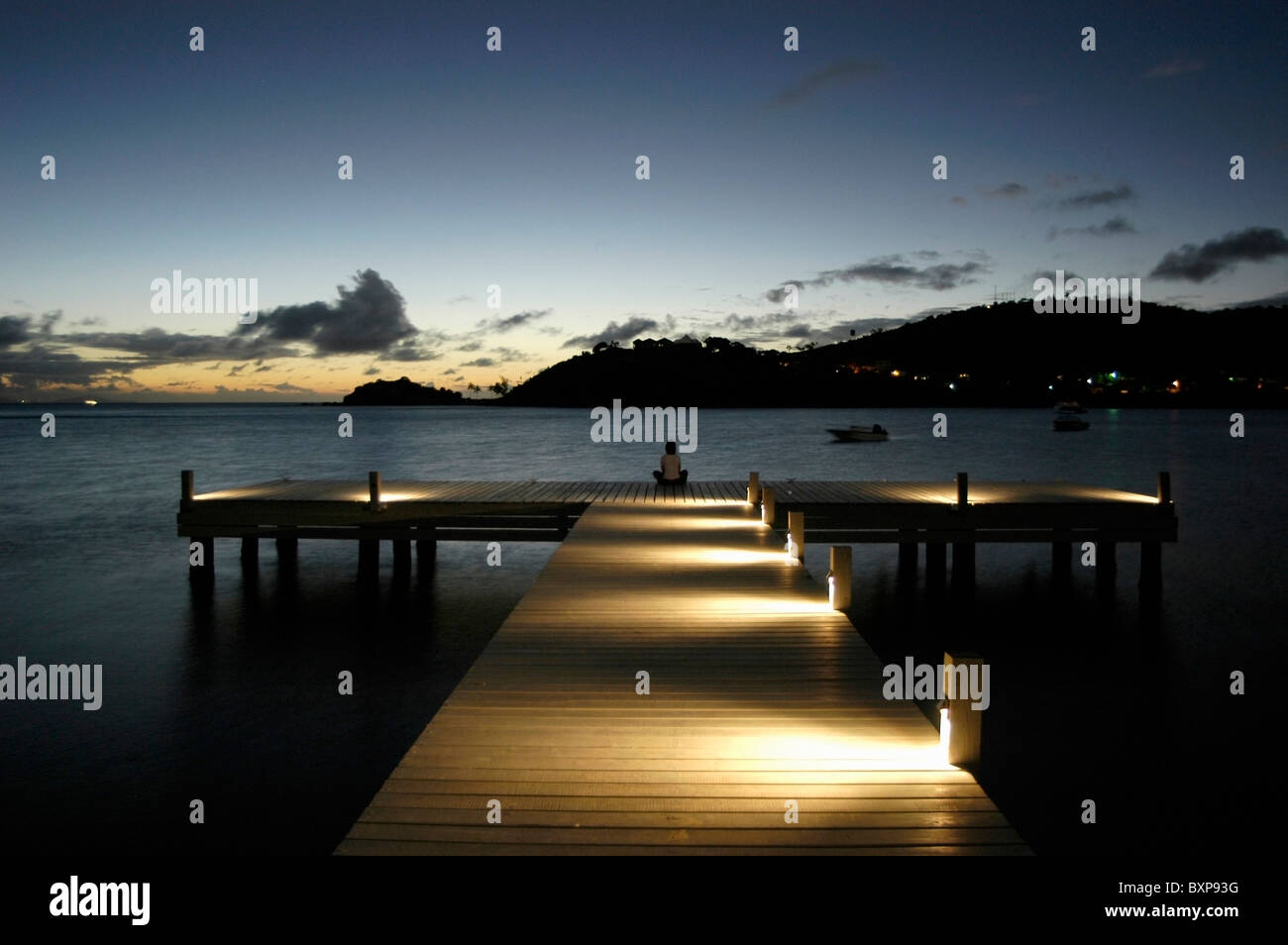Sitting on end of pier hi-res stock photography and images - Alamy