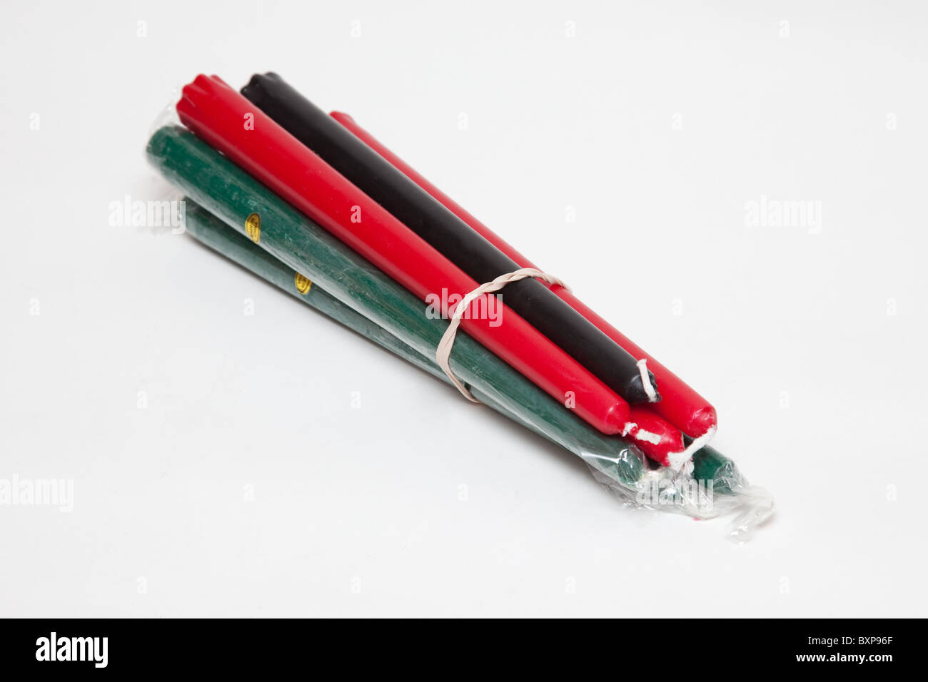 Mishumaa Saba, three green, three red and one black candle, symbolize ...