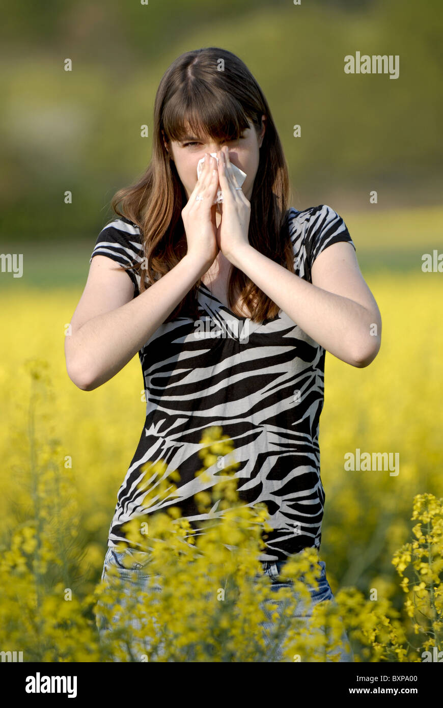 Young woman suffering from hay fever Stock Photo - Alamy