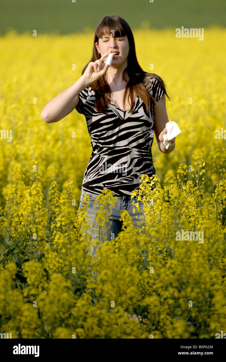 Young woman suffering from hay fever Stock Photo - Alamy