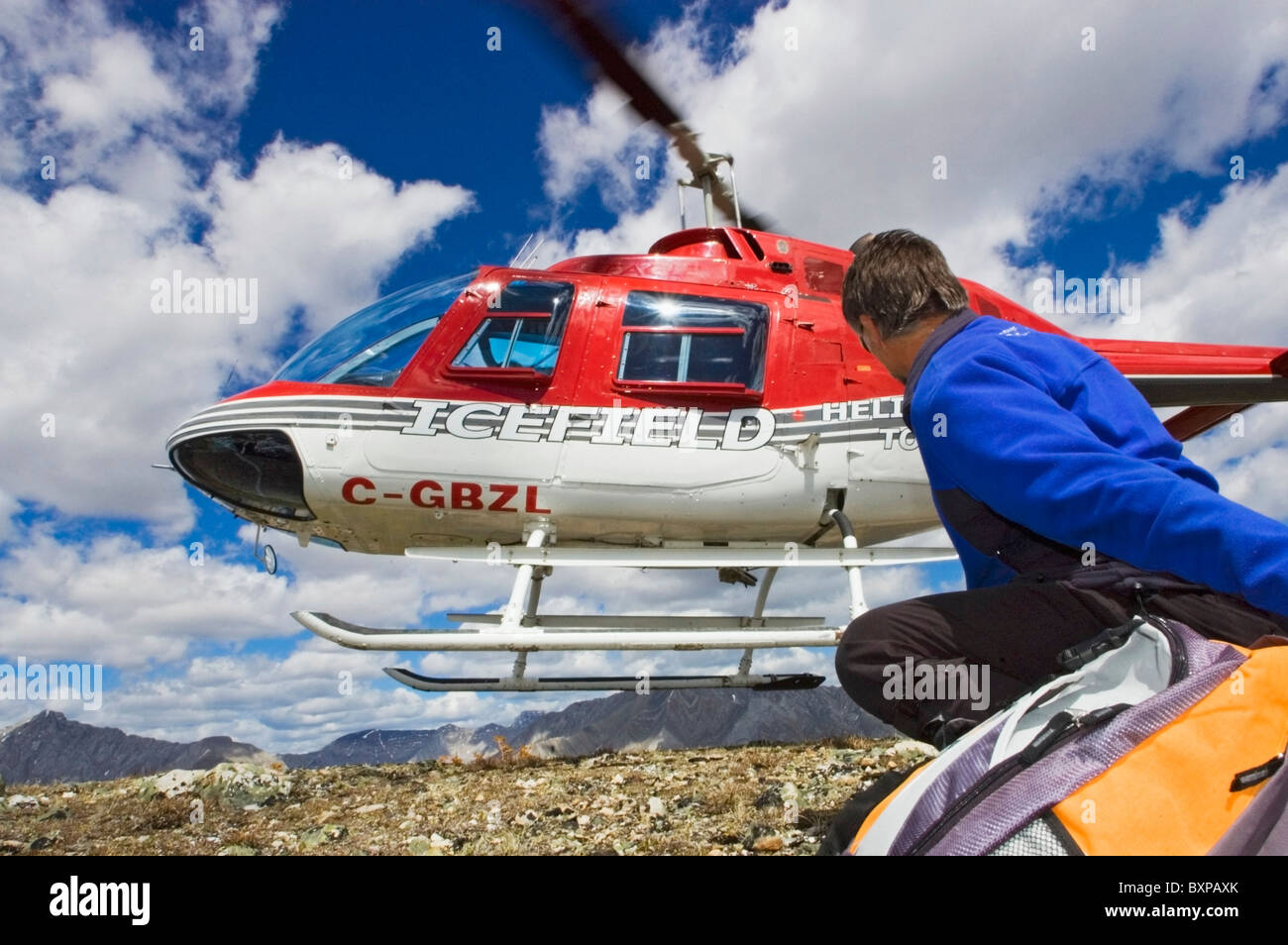 Helicopter Dropping Off Tourist At Columbia Icefield Stock Photo - Alamy