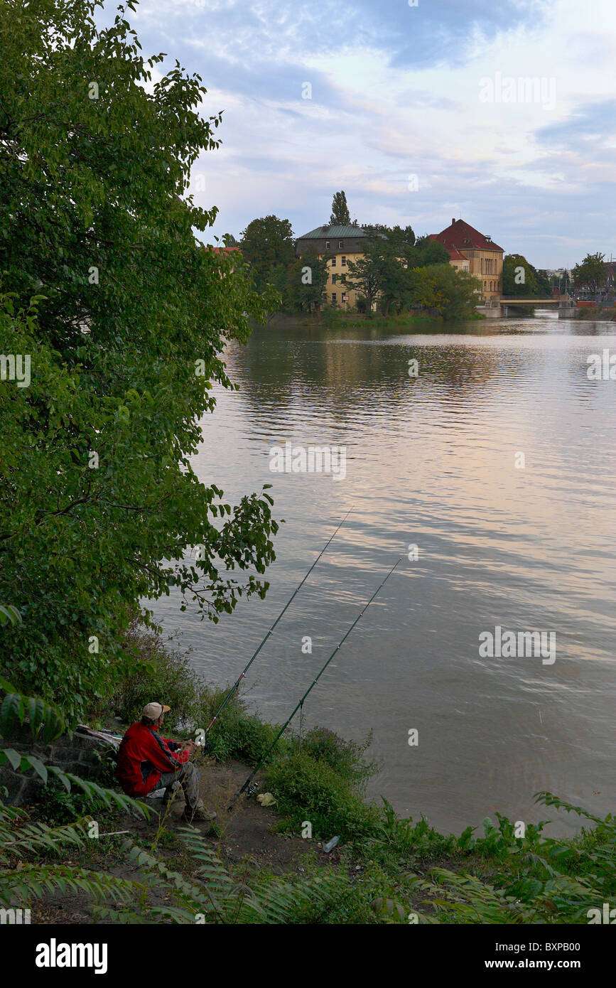 Angler sitting on a bank of the Oder, Wroclaw, Poland Stock Photo - Alamy