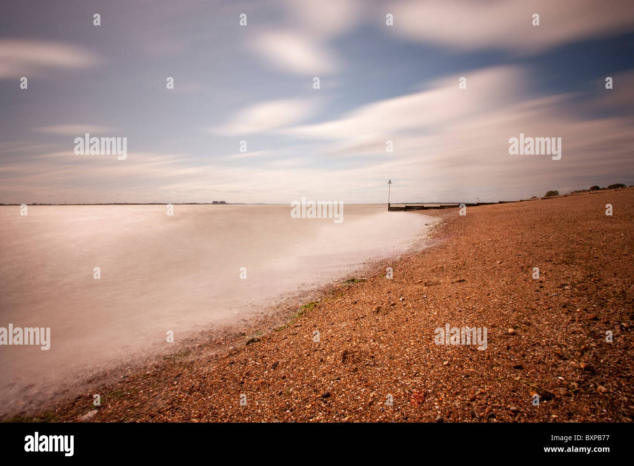 long exposure of the beach at mersea in essex Stock Photo - Alamy