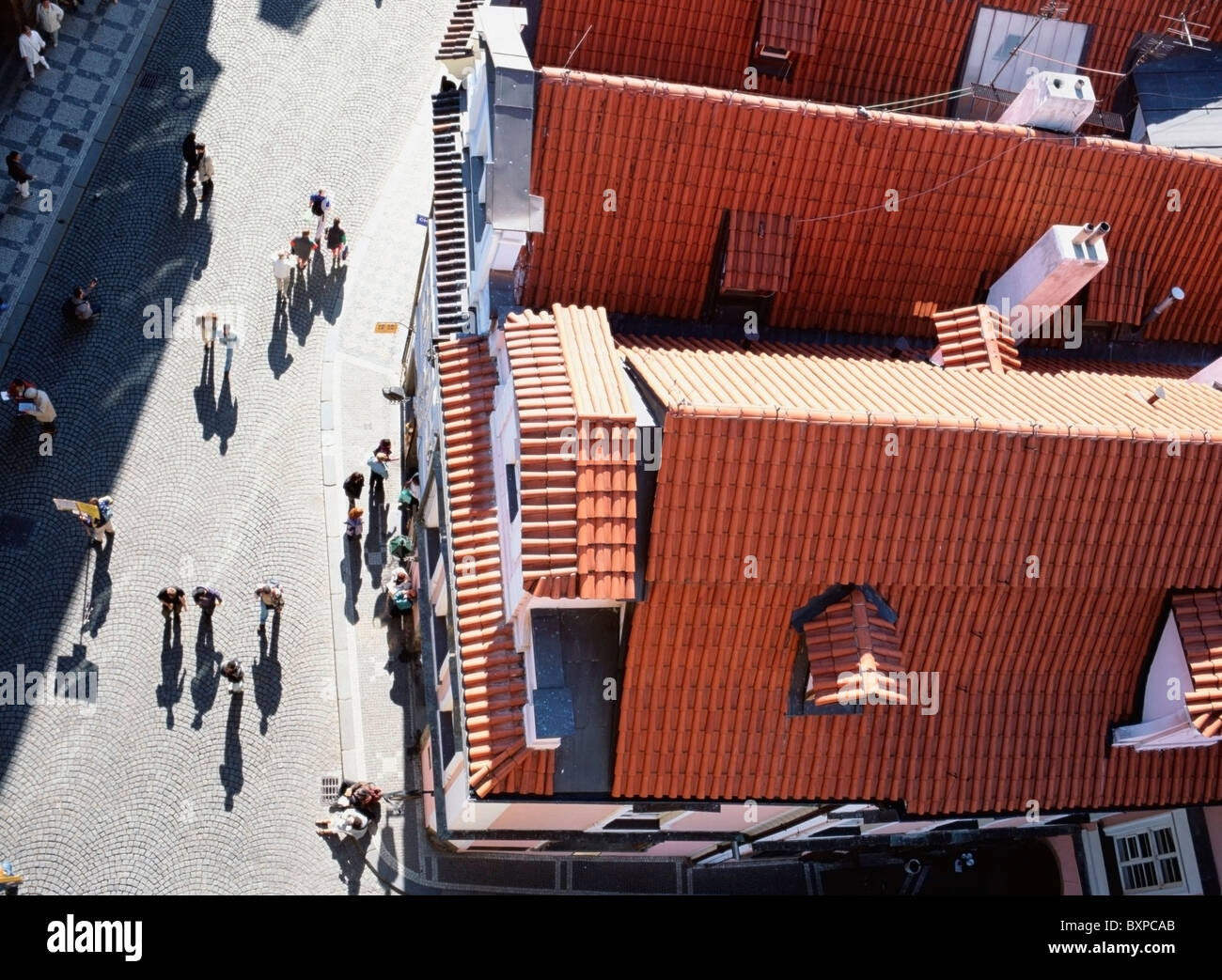 People Walking On Cobblestone Streets Next To Buildings, Aerial View ...