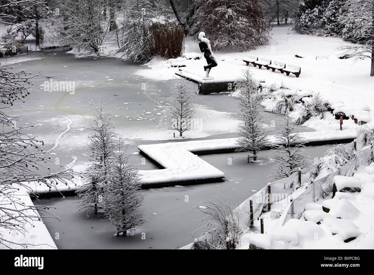 Winter in a park, snow covered interiors and exteriors. Quiet, lonely ...