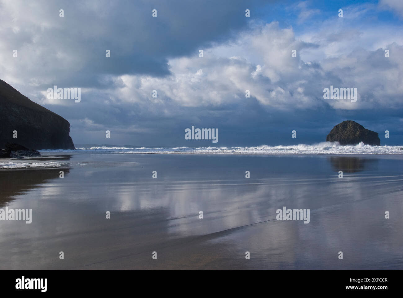 A strong swell has produced some wonderful reflections in the sand at ...