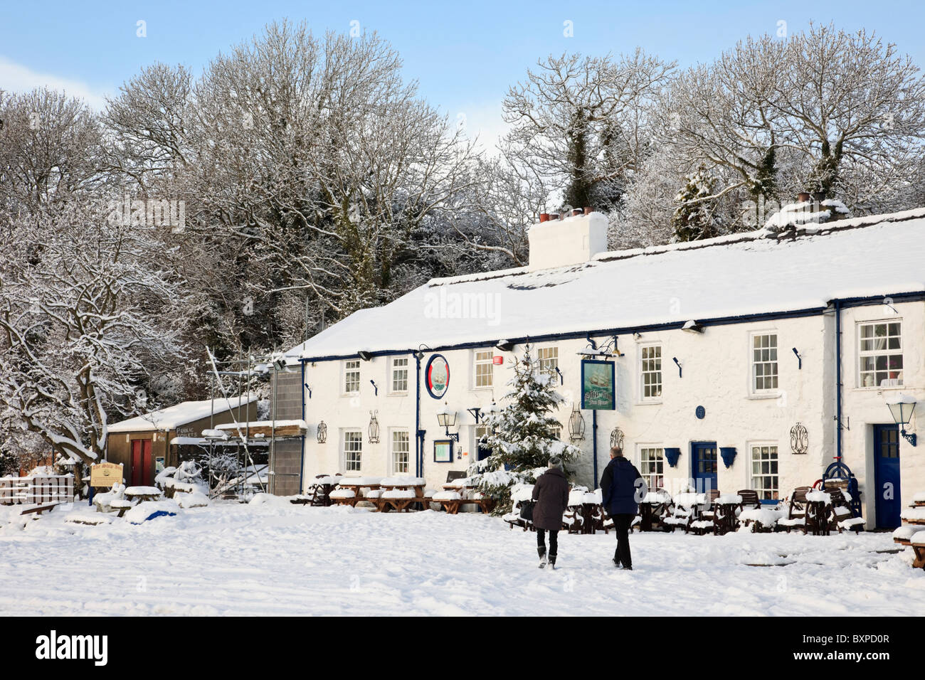 The Ship Inn historic village pub with snow in winter 2010. Red Wharf ...