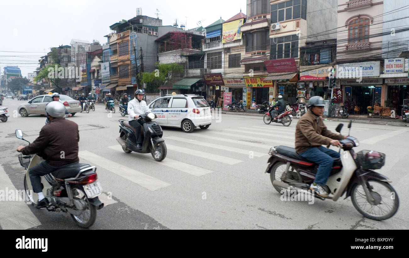 Hanoi scooter busy hi-res stock photography and images - Alamy