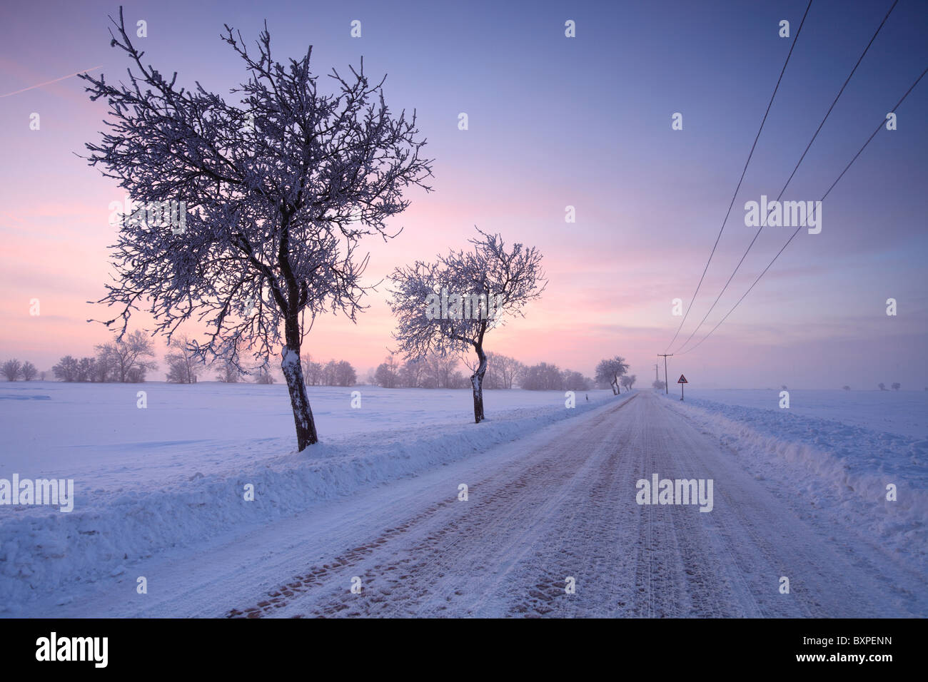 Road trails in snow winter hi-res stock photography and images - Alamy