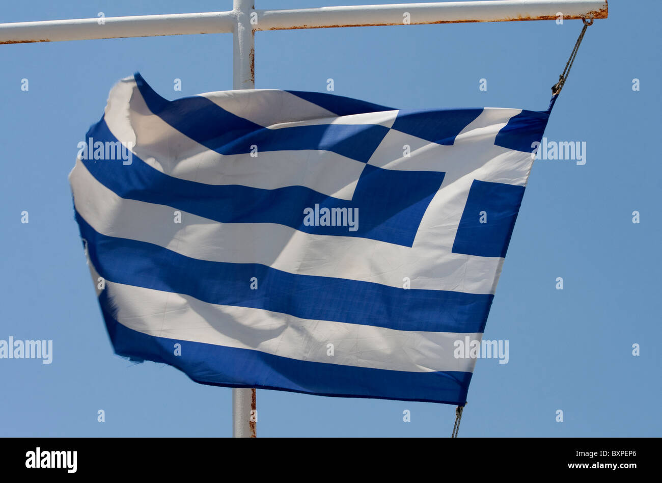 Greek flag blowing in the wind, Greece Stock Photo - Alamy