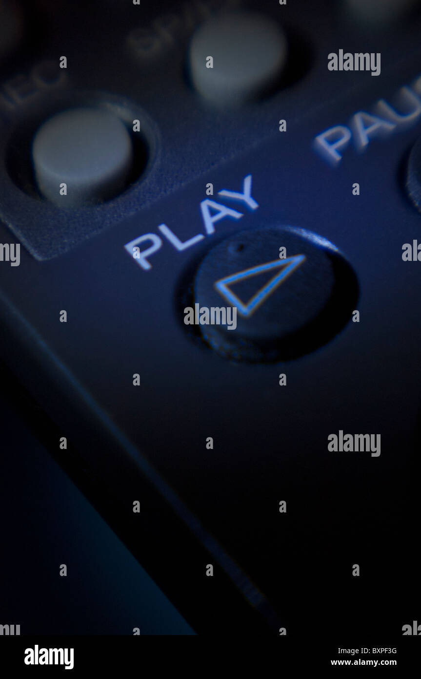 Close-up of PLAY button on a remote control device Stock Photo - Alamy