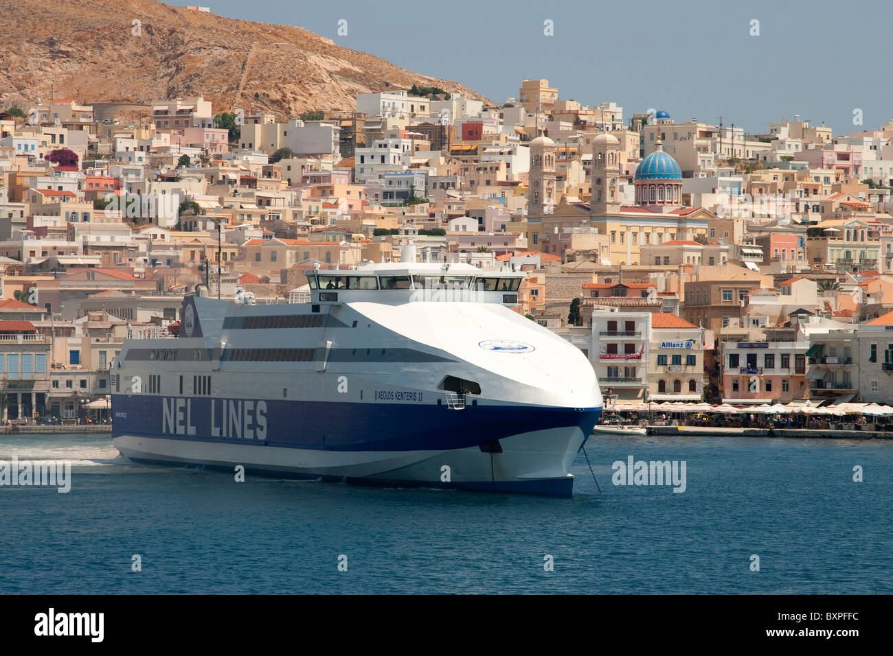 Ferry leaving the port of Ermoupoli on the island of Syros, Cyclades ...