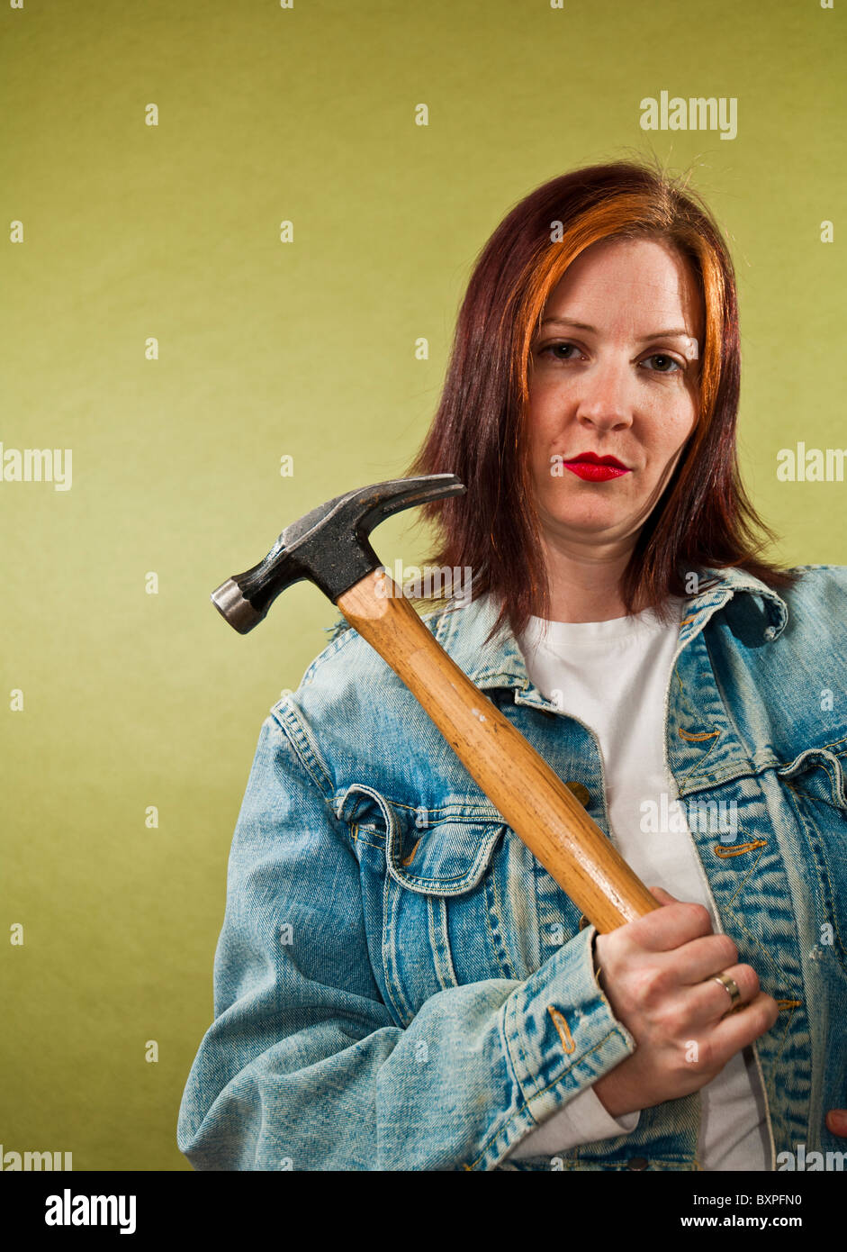 Self-sufficient, confident woman with hand tool Stock Photo - Alamy