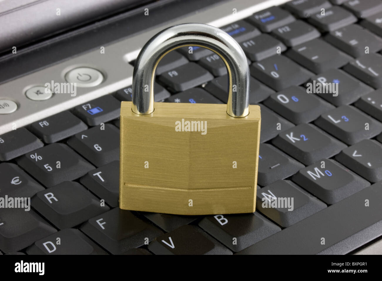 Locked padlock on a laptop Stock Photo - Alamy