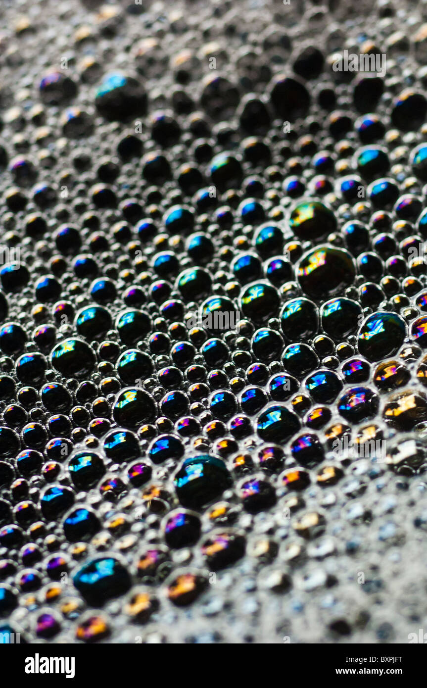 Soap bubbles floating on water Stock Photo - Alamy