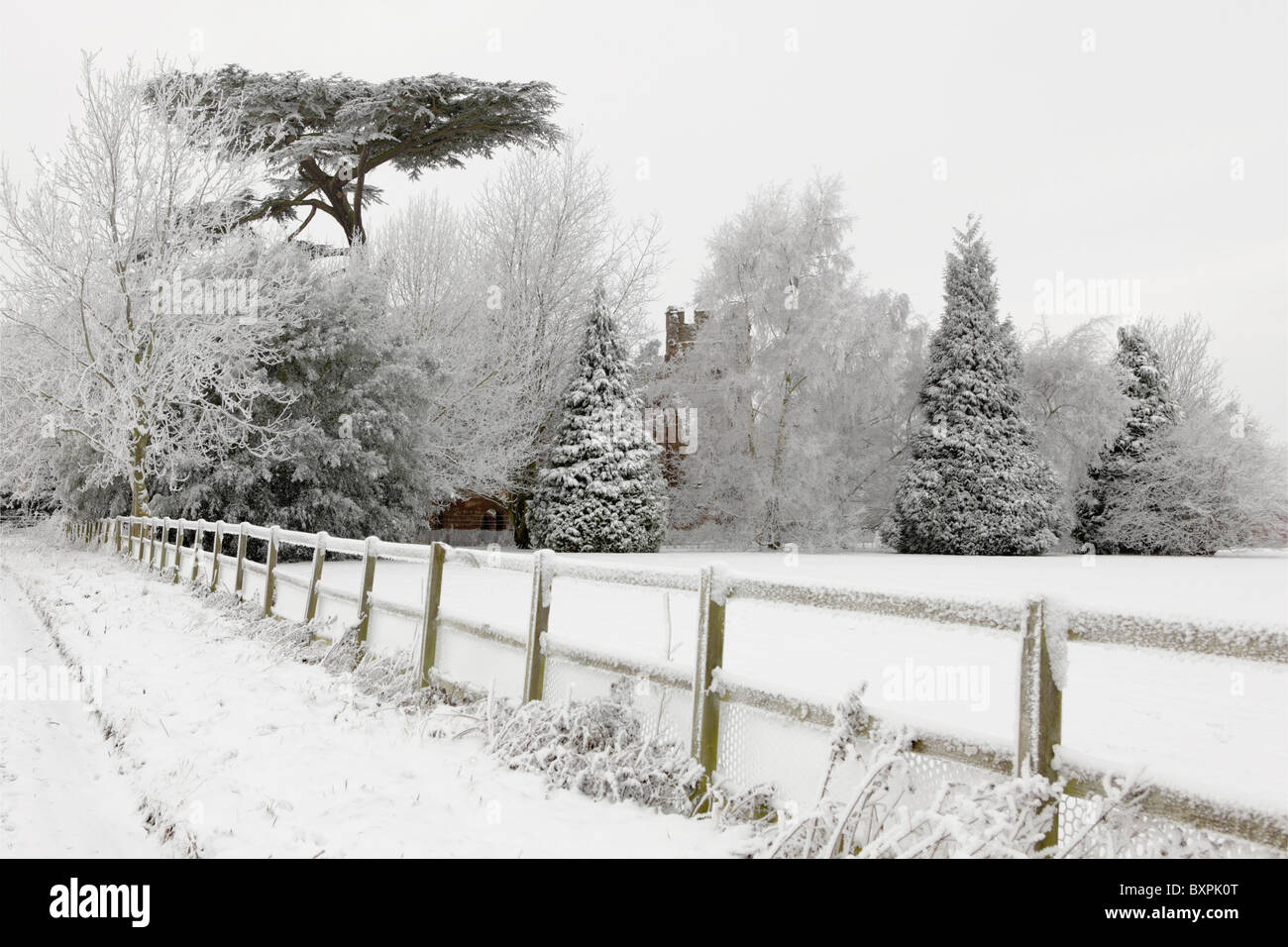 Wintry landscape at Acton Burnell,it`s famous castle slightly obscured ...