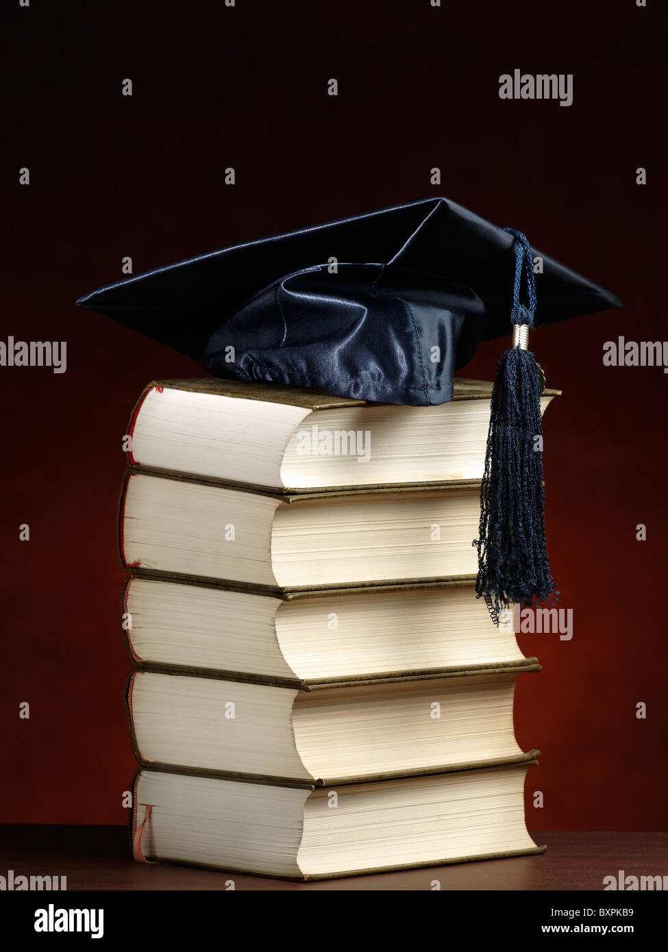 graduation cap on top of the stack of books, for various graduation ...