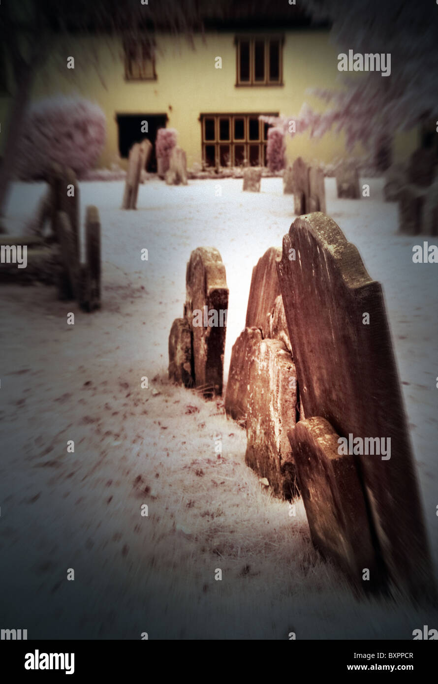 house behind gravestones Stock Photo - Alamy