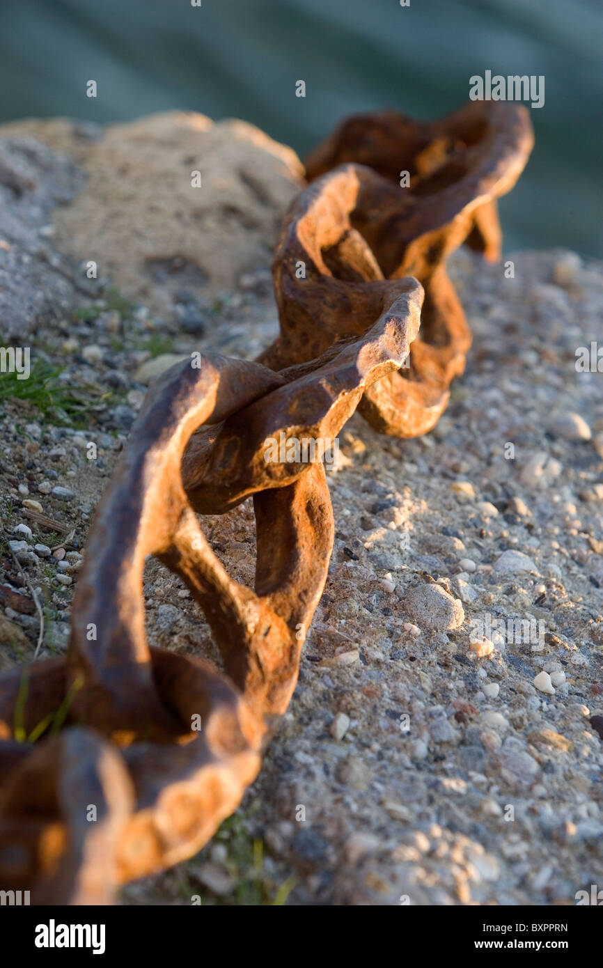A rusty chain in a harbour Stock Photo - Alamy