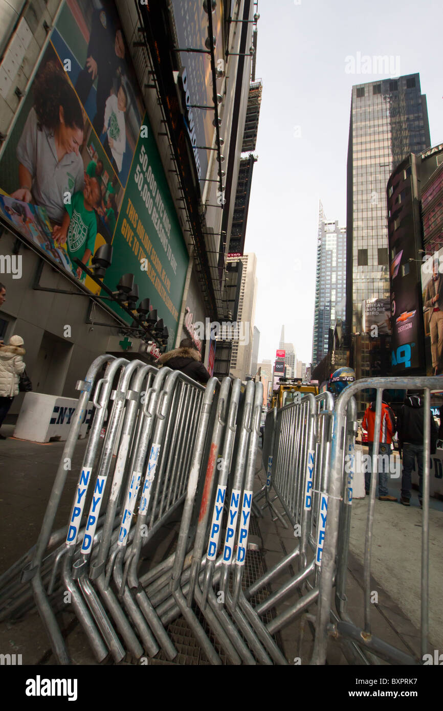 Barriers stand ready to be erected to control the crowds in Times ...