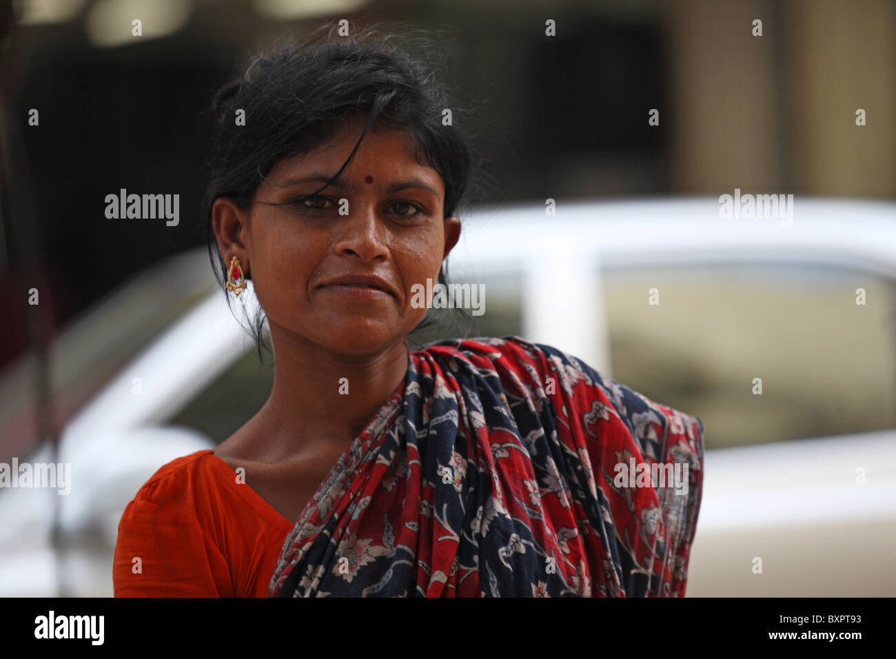 Female labourer smiling at camera, Calcutta, India Stock Photo - Alamy