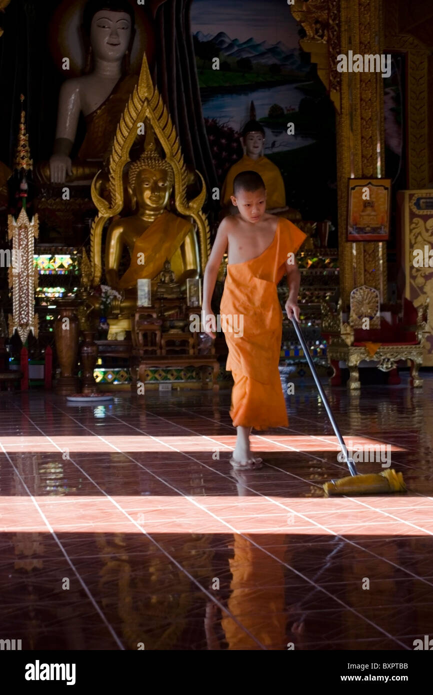 Buddhist monk cleaning shiny floor hi-res stock photography and images ...
