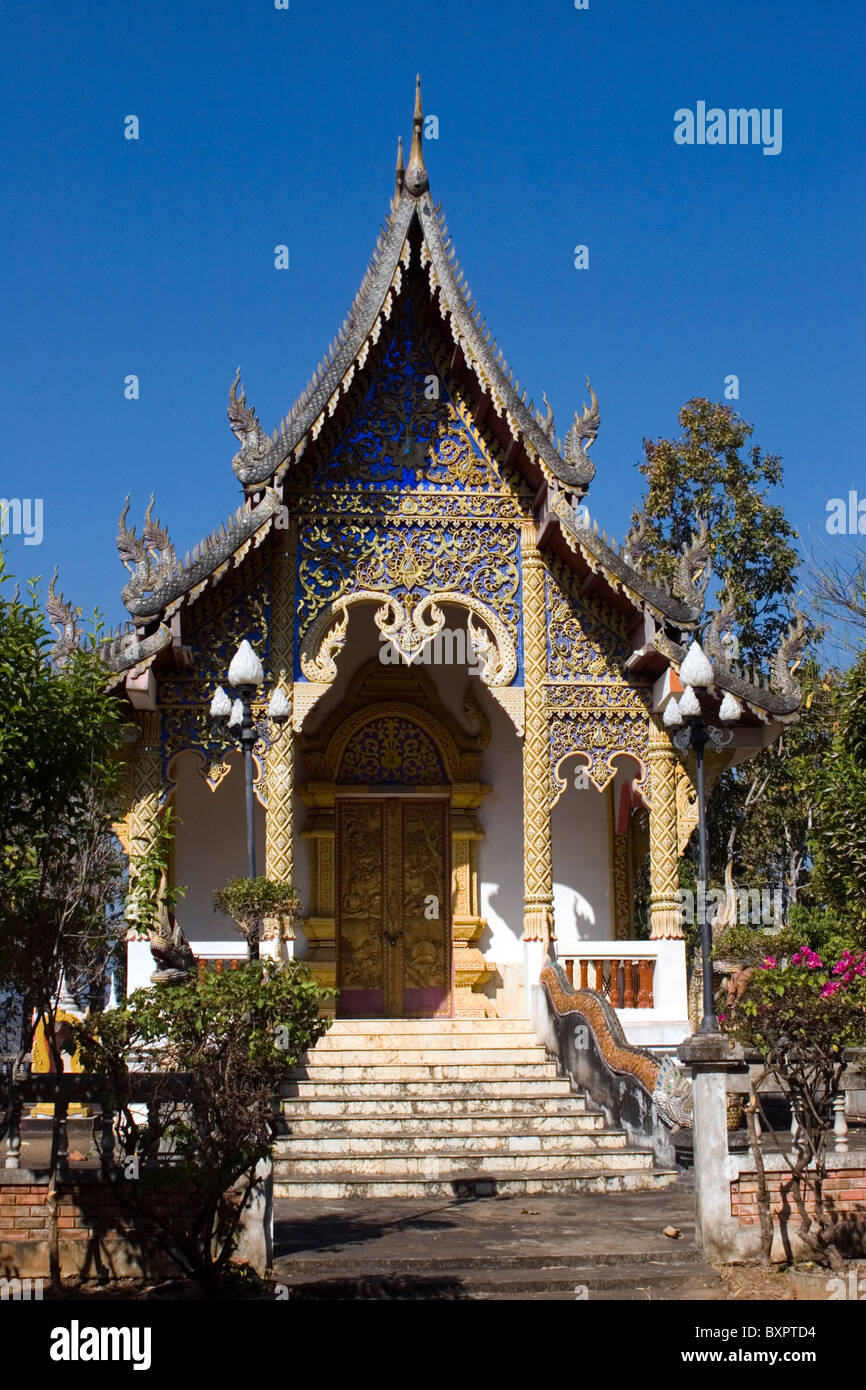 A beautiful Buddhist temple decorated with ornate designs is part of ...
