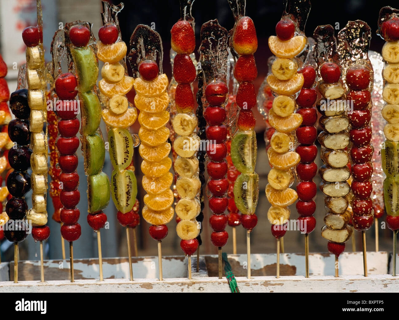 Sugared Fruits On Sale In A Market Stock Photo - Alamy