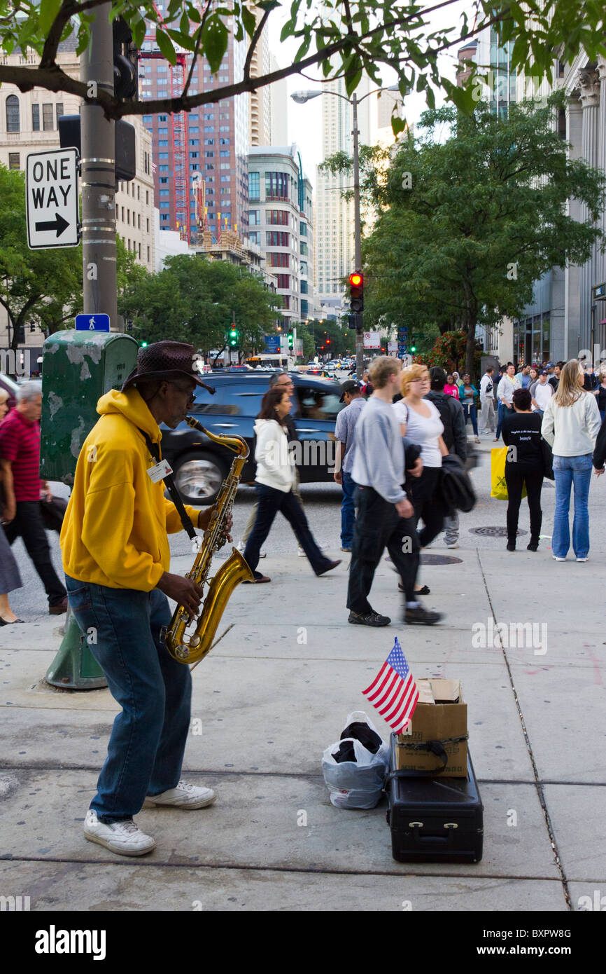 street musician playing to crowds on Michigan Street, Chicago, Illinois ...
