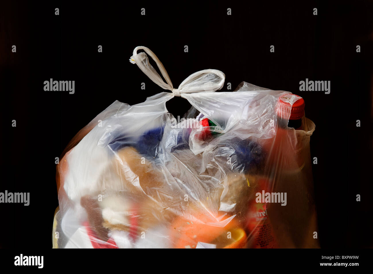 Plastic bag full of rubbish hi-res stock photography and images - Alamy