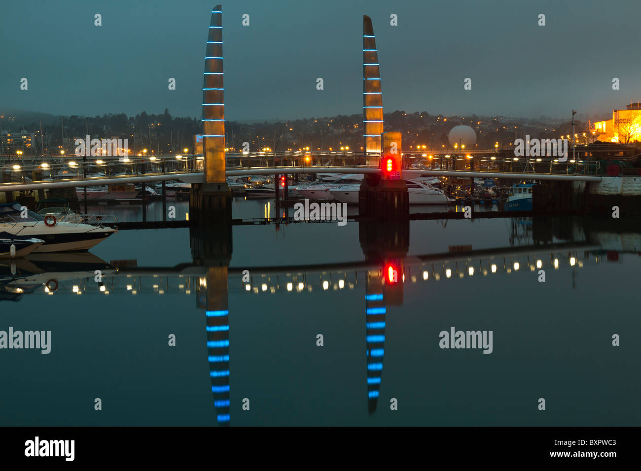 Torquay harbour footbridge at night Stock Photo - Alamy