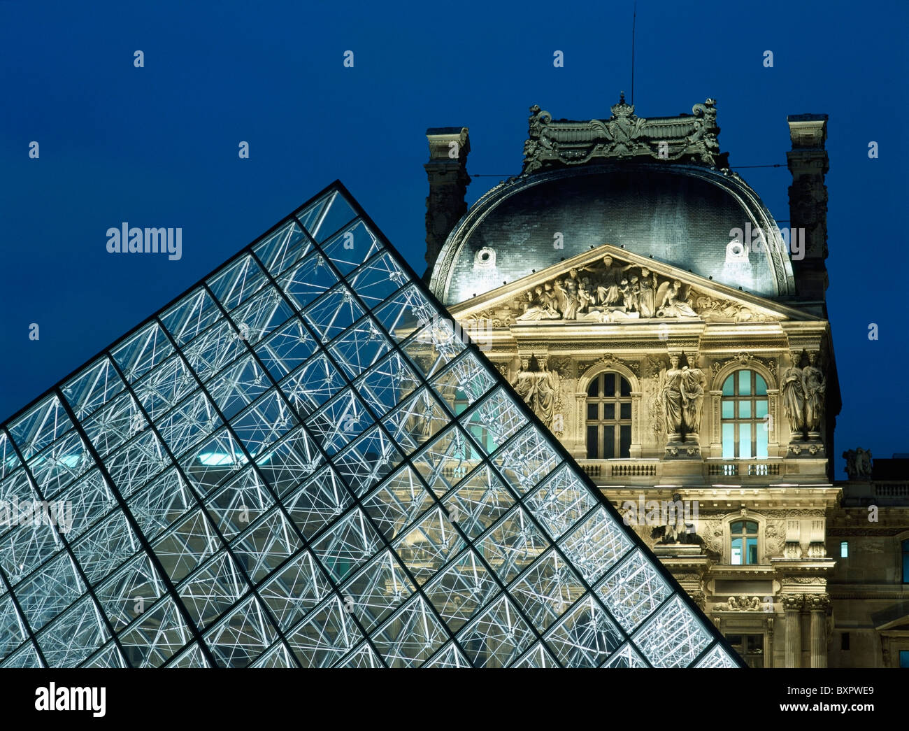 Detail Of The Glass Pyramid Outside The Louvre Museum At Dusk Stock ...