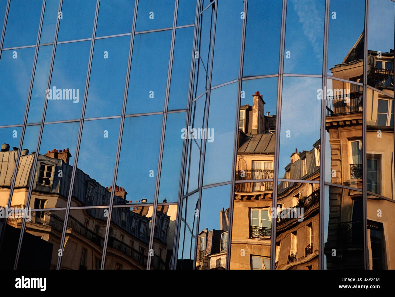Reflections Of Apartment Buildings In Modern Glass Skyscraper, Paris ...
