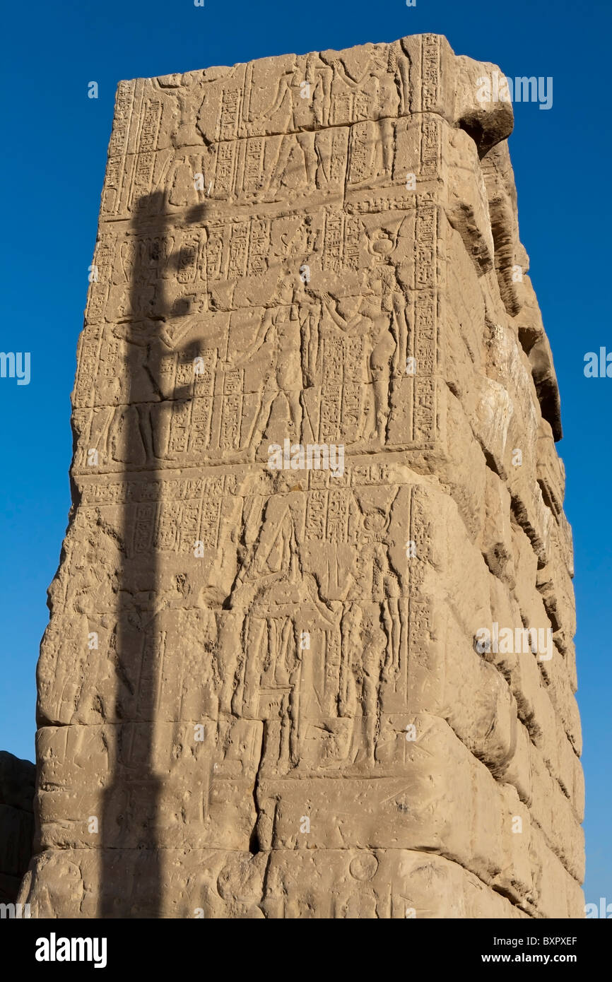 Pylon and shadow at Temple of Deir el-Shelwit dedicated to the Goddess ...
