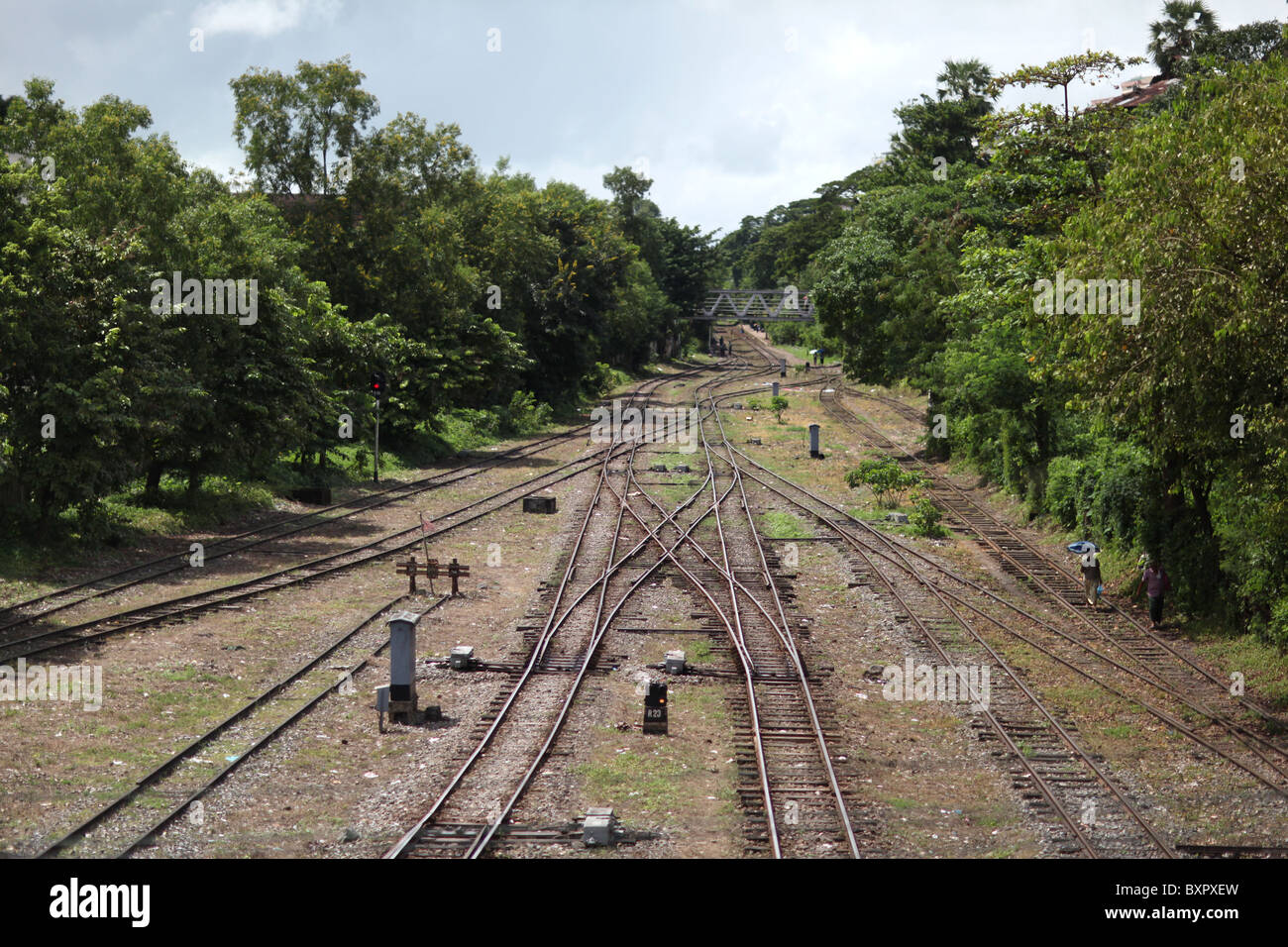 A view of the rail track running through Yangon or Rangoon, Myanmar or ...