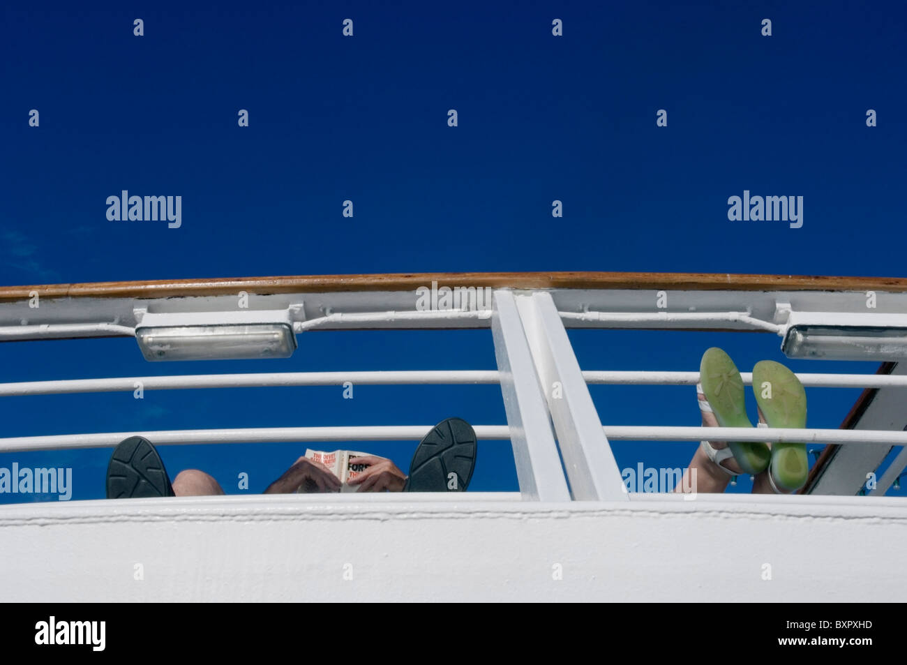 Feet propped up hi-res stock photography and images - Alamy