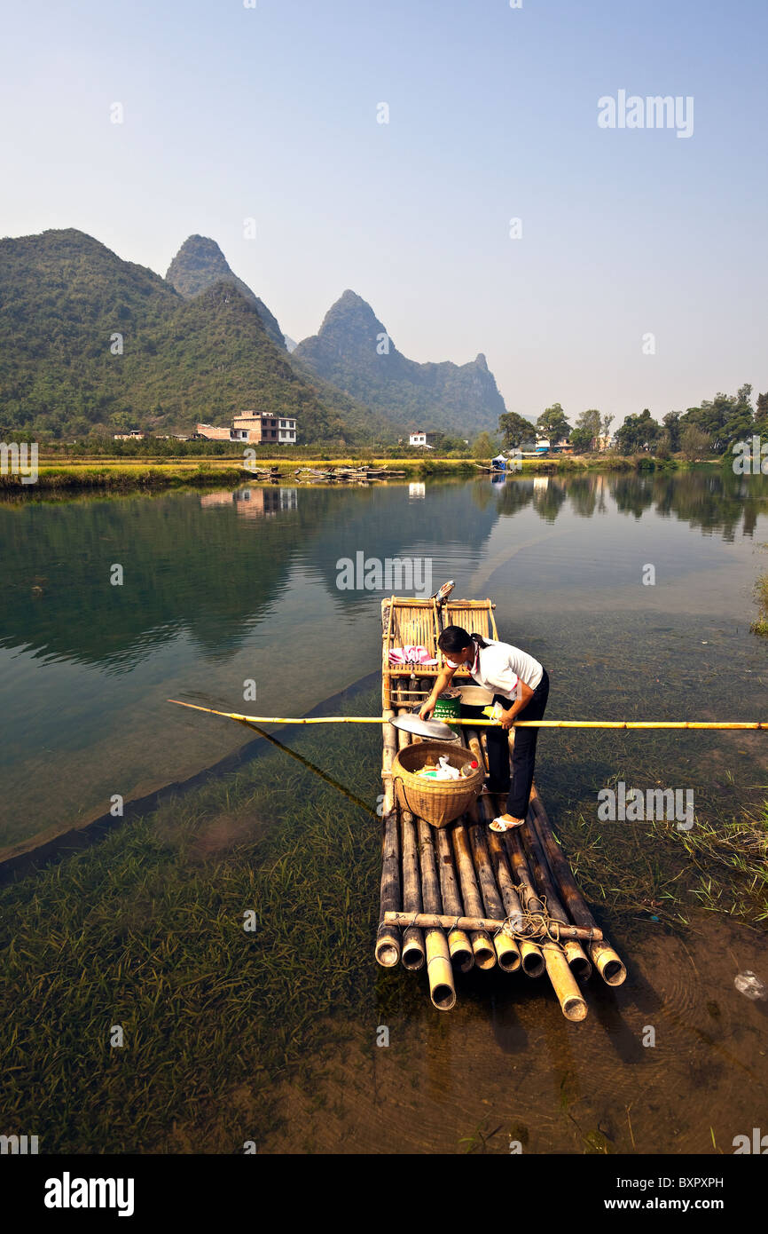 China, Guangxi Province, Yangshuo. Bamboo rafting on the Jade Dragon ...