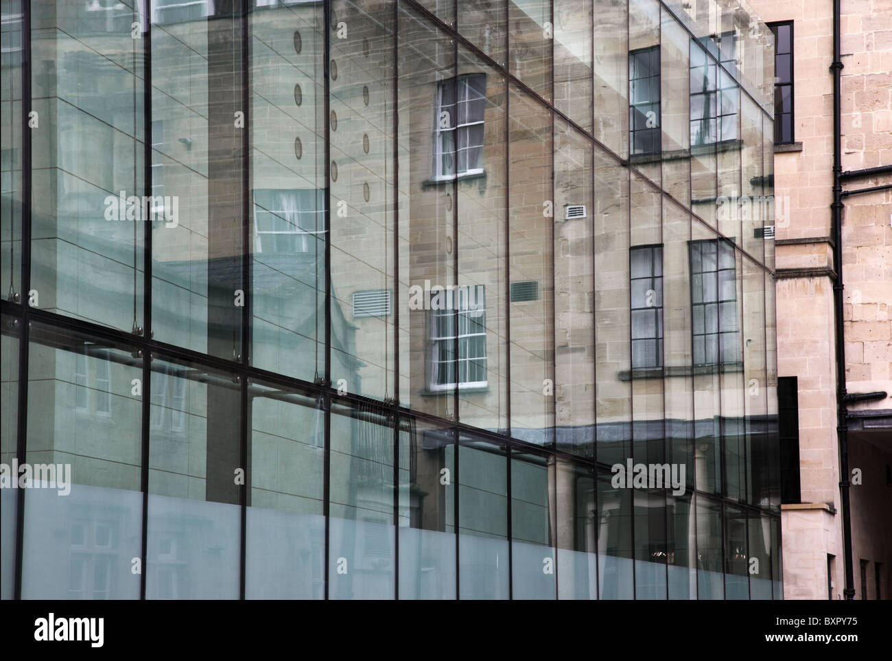 Windows of the Bath Spa building showing reflections of Bath stone ...