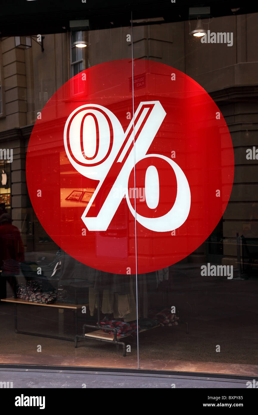 Shop window in Bath displaying % percent sign for thie January sale ...