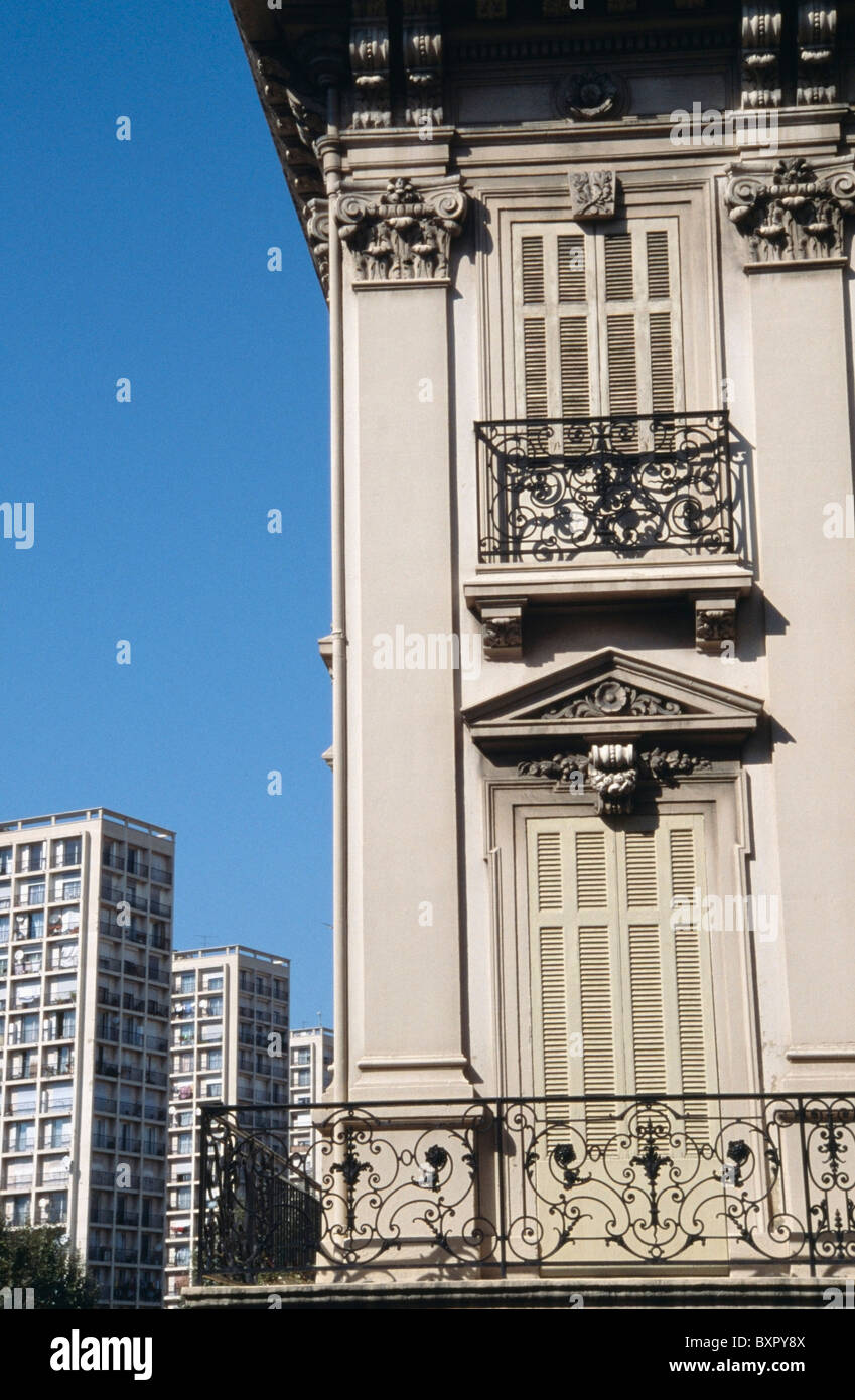 Traditional Shuttered Window And Modern Tower Blocks Stock Photo - Alamy