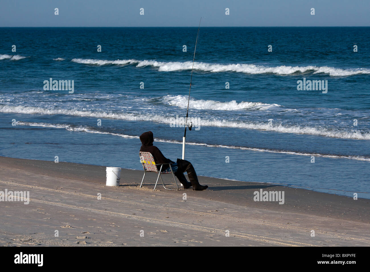 Florida beach surf fishing Stock Photo - Alamy