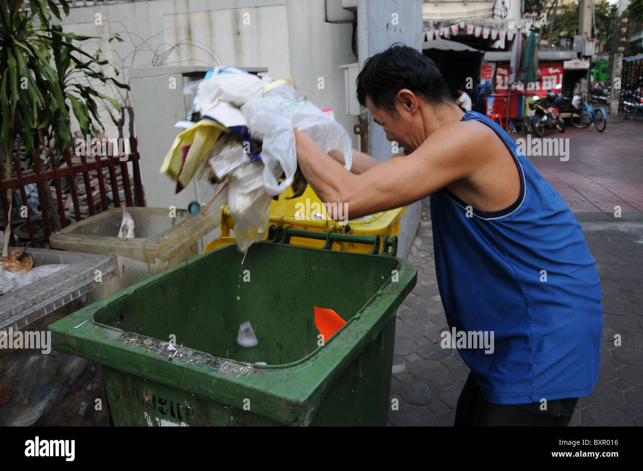 Man seperate Waste Stock Photo - Alamy