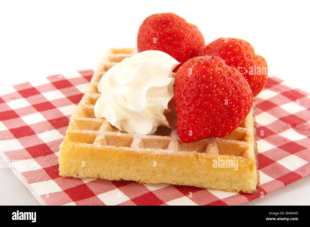 Belgium traditional waffle with strawberries and whipped cream Stock ...