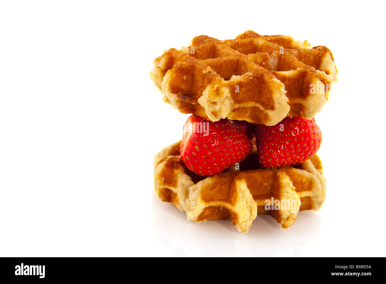 Belgium traditional waffle with strawberries on white background Stock ...