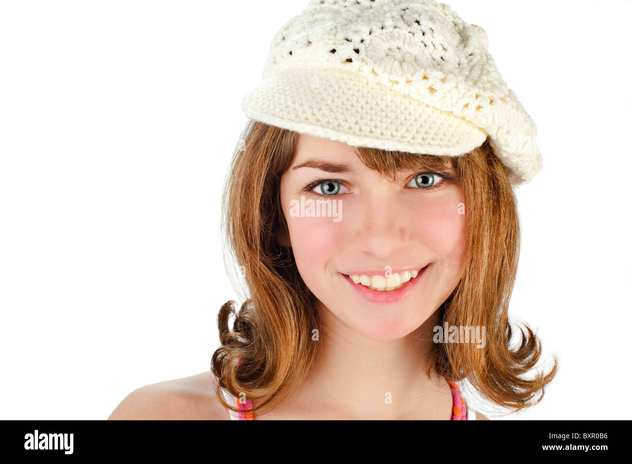 Portrait of young beautiful smiling girl in cap Stock Photo - Alamy